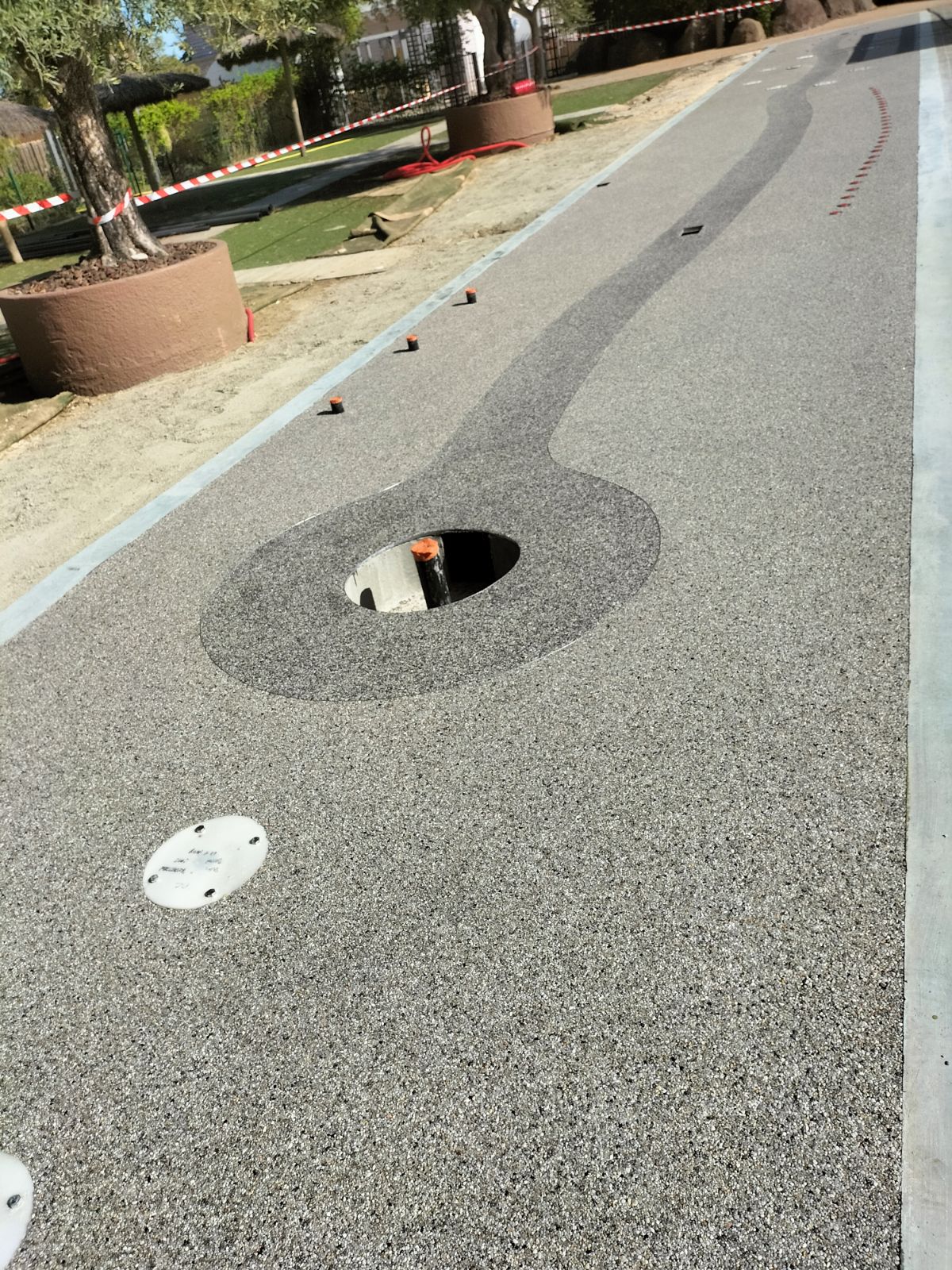 RÉSINÉO® : REVÊTEMENT DE SOL DRAINANT - TSBI