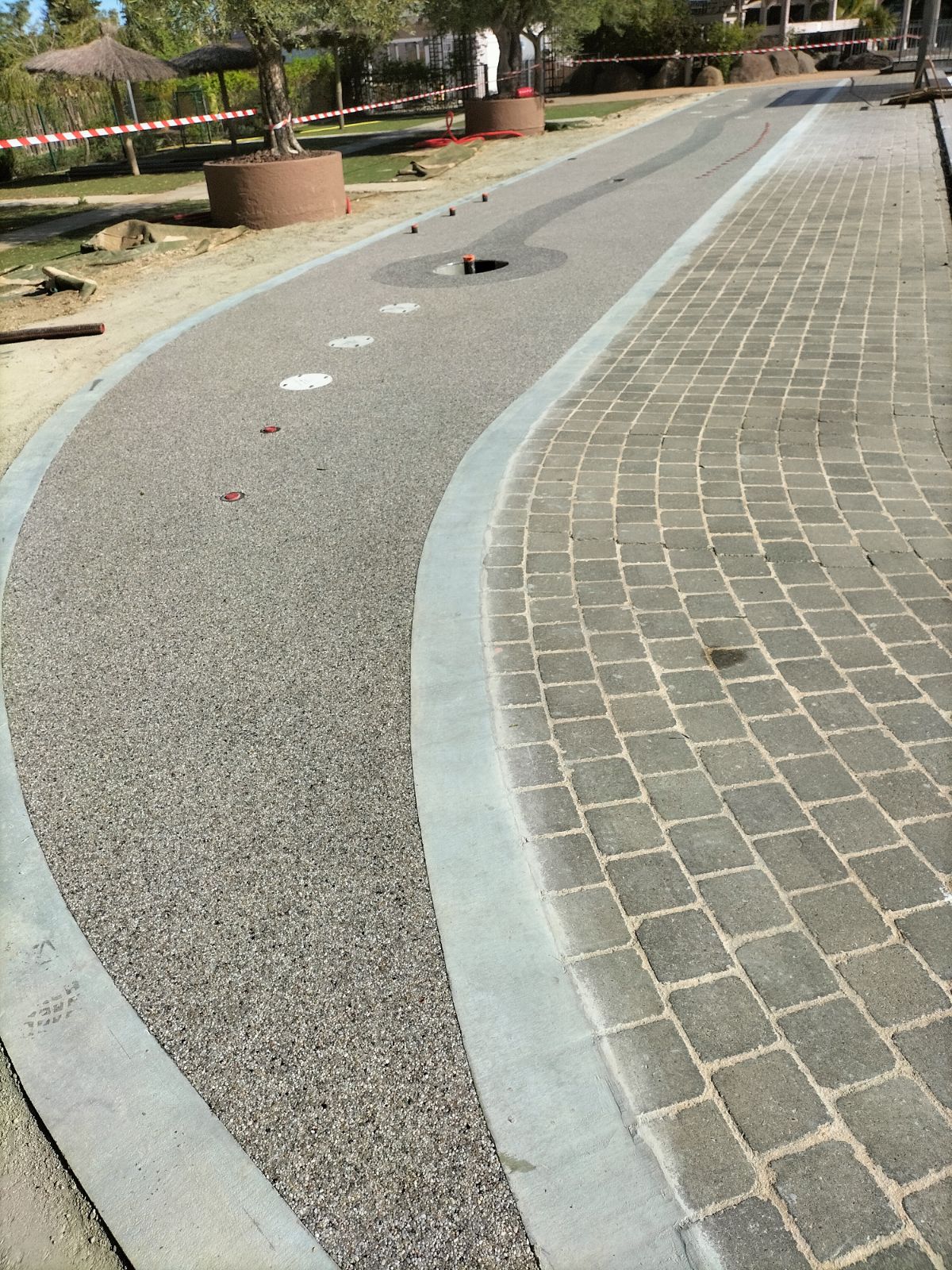 RÉSINÉO® : REVÊTEMENT DE SOL DRAINANT - TSBI