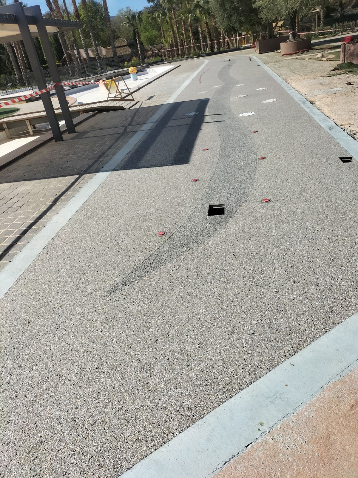 RÉSINÉO® : REVÊTEMENT DE SOL DRAINANT - TSBI